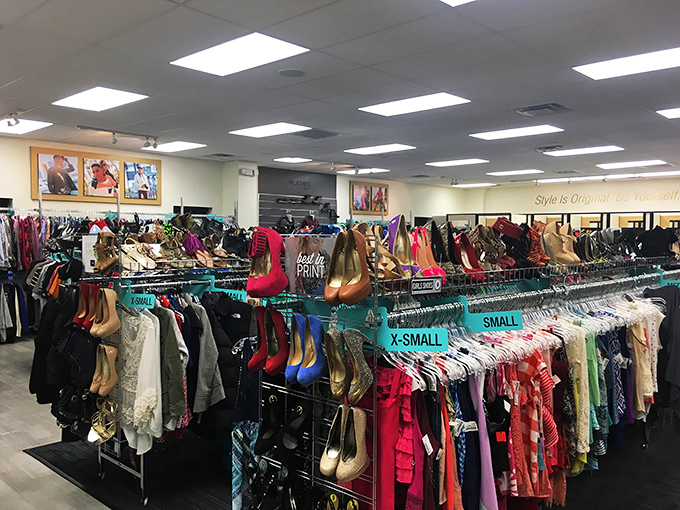 "Style is Original. Be Yourself." The store's mantra floats above a sea of clothing where budget-conscious fashionistas navigate by size markers.