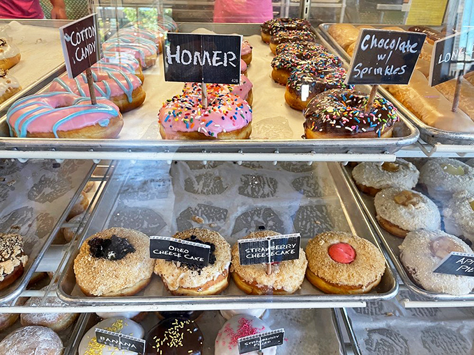 The display case&mdash;where dreams and diets go to battle. Each little chalkboard sign is both an introduction and a temptation that whispers, "Diet starts tomorrow."