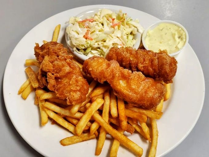 Fish and chips that would make a British pub jealous, with a golden batter crunch that deserves its own sound effect.