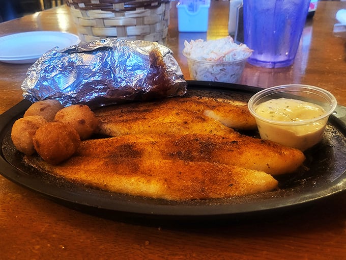 Even seafood gets the royal treatment here, with perfectly seasoned fillets and hush puppies that would make Neptune himself switch residences to North Carolina.
