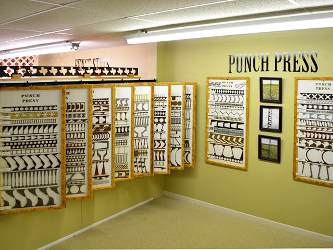 The "Punch Press" display showcases the industrial art behind barbed wire manufacturing. Like a jewelry store for farmers with very specific taste.