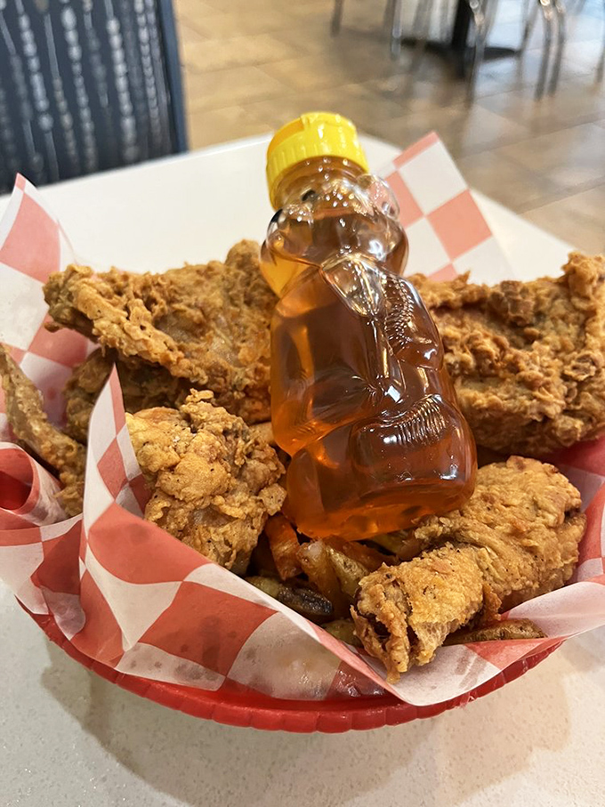 Fried chicken nestled in a bear hug of honey – a sweet-savory romance that makes you wonder why you'd ever order anything else.