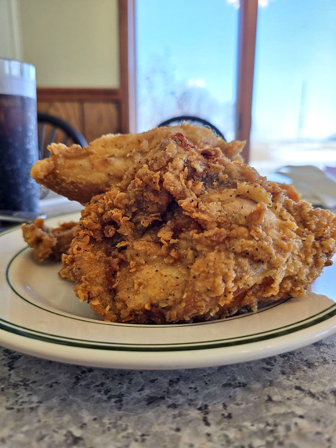 This isn't just fried chicken; it's edible armor&mdash;gloriously crunchy outside, tender within, and worth every napkin you'll need afterward.
