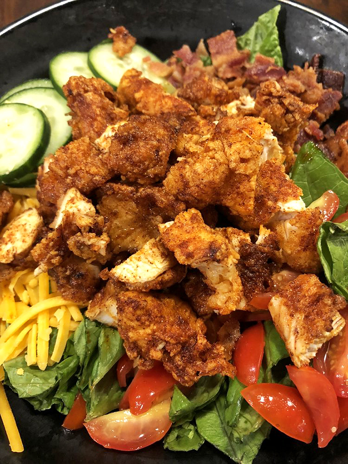 Who said salads can't be exciting? This protein-packed masterpiece proves fried chicken can elevate even the most virtuous of meals.