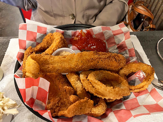 Golden-fried perfection that would make any Southern grandmother nod in approval. The checkered paper basket feels like a hug.