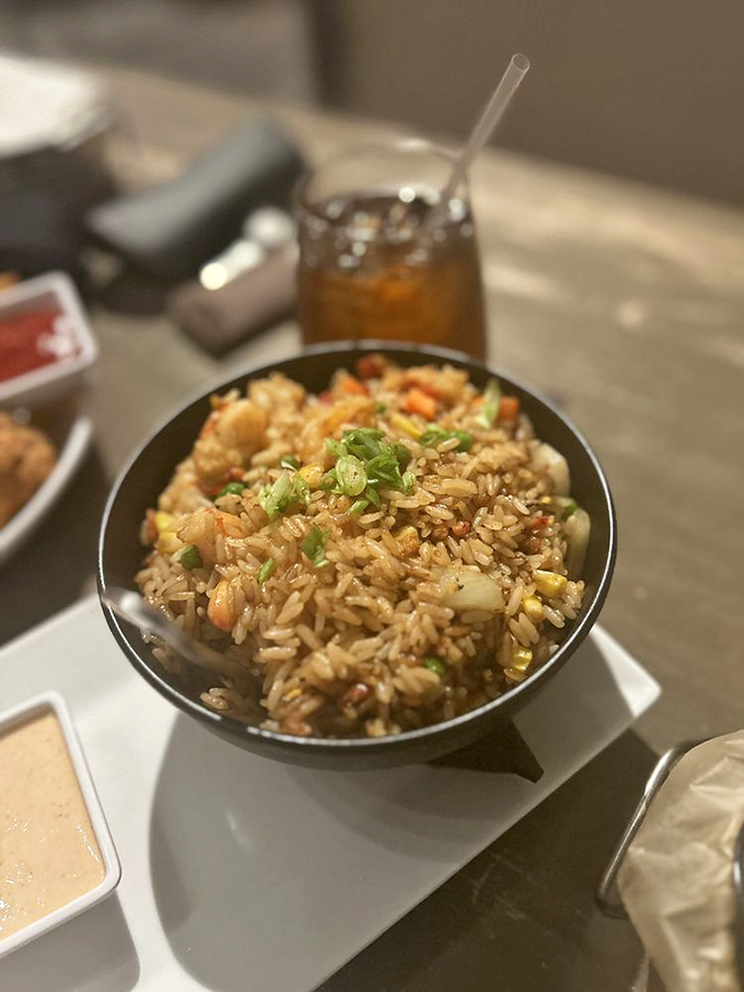 This isn't just rice&mdash;it's a seafood treasure hunt where every forkful reveals sweet morsels of shrimp and vegetables in perfect harmony.