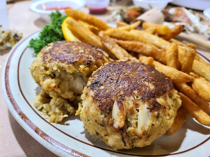 These crab cakes aren't playing hard to get—they're flaunting their jumbo lump credentials with a golden crust that shatters at first bite.