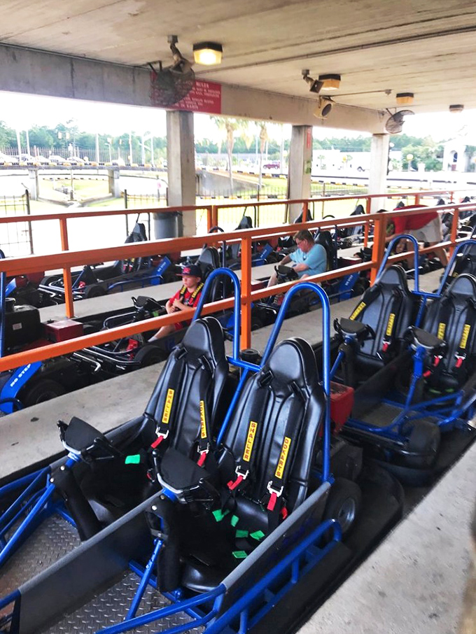 The starting line: where polite conversation ends and the real family dynamics begin. These aren't just go-karts; they're relationship truth serum on wheels.