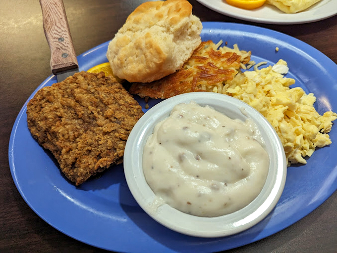 Country fried steak, creamy gravy, and hash browns that somehow manage to be both crispy and tender&mdash;a blue plate special worth writing home about.
