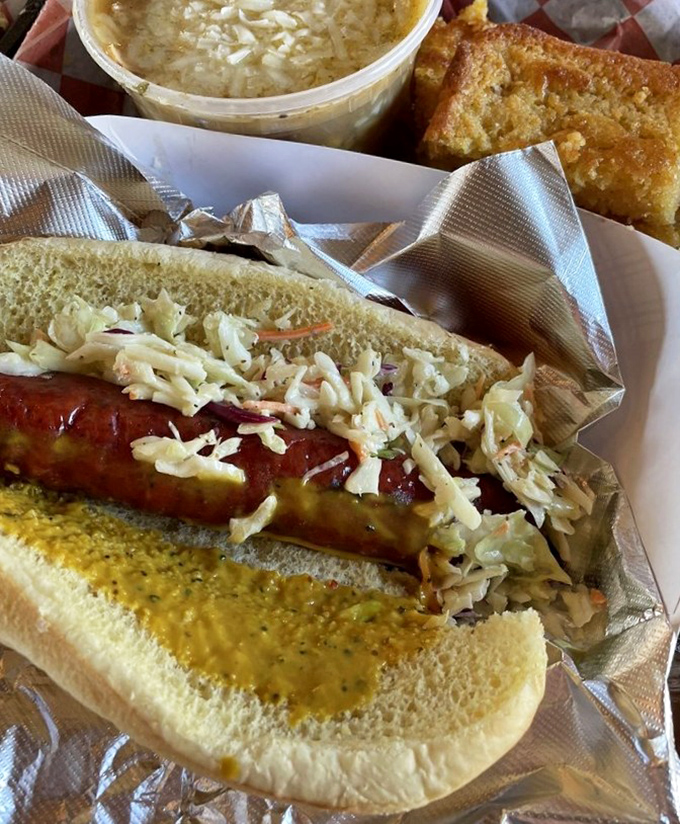 Not your average ballpark frank! This sausage sandwich topped with tangy slaw is what happens when barbecue masters decide to reinvent the classics.