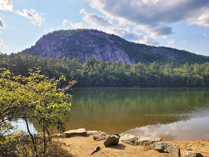 Mother Nature showing off again&mdash;Cathedral Ledge rises majestically above Echo Lake like a granite monument to outdoor perfection.
