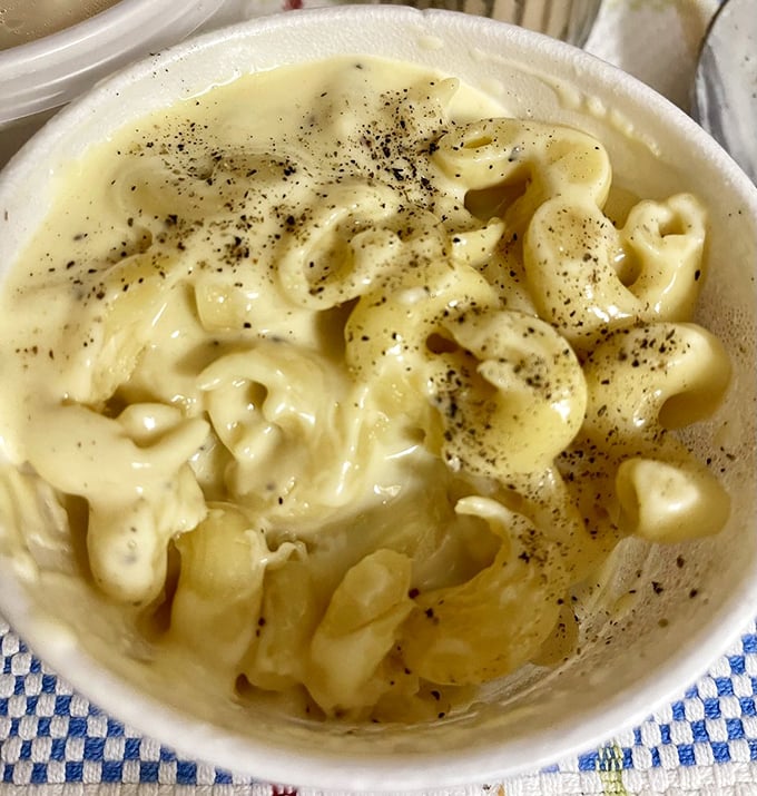 Mac and cheese that looks like it's posing for its glamour shot. The pepper flecks aren't just seasoning&mdash;they're beauty marks on this creamy masterpiece.