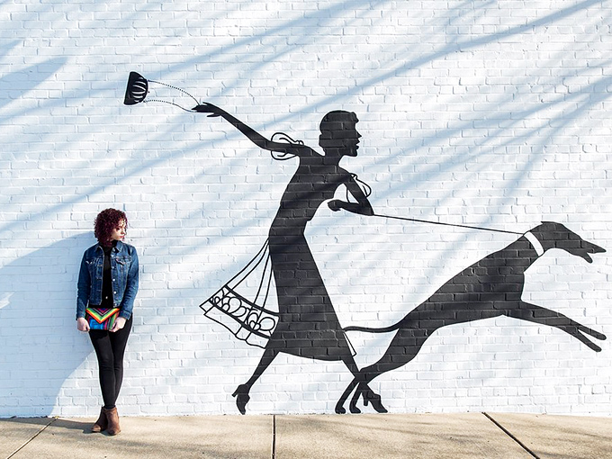The museum's exterior mural celebrates women in motion&mdash;because carrying the perfect bag is practically an Olympic sport.
