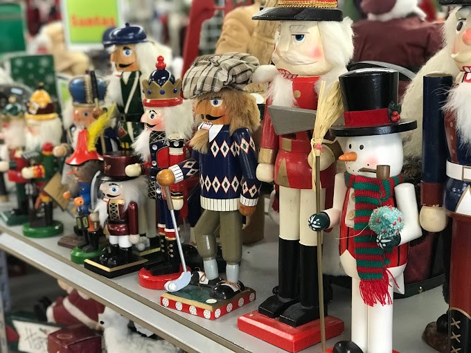 An army of nutcrackers stands at attention, ready to march from someone's holiday donation straight into your December decor lineup.