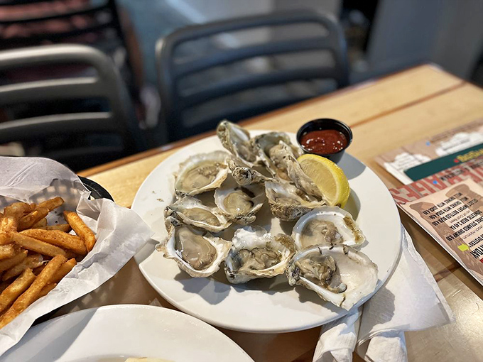These oysters aren't just served; they're presented &ndash; nature's perfect appetizer with a squeeze of sunshine.