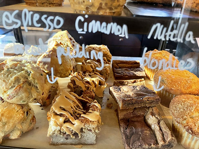 Pastry case of champions. Each square and crumb promises a different path to happiness, all equally compelling.
