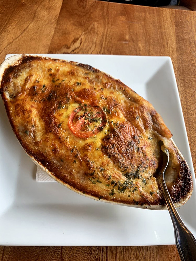 That perfectly browned cheese crust on the Shepherd's Pie isn't just cooking—it's edible architecture designed to make you swoon.