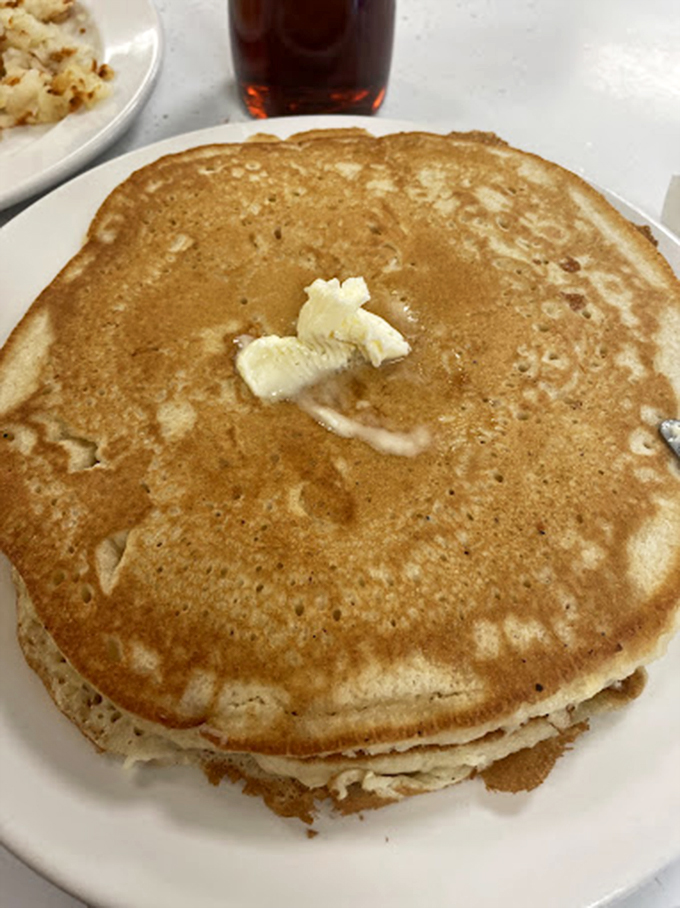 Behold the humble pancake stack &ndash; golden-brown, butter-crowned royalty that's been solving life's problems one breakfast at a time since 1958.