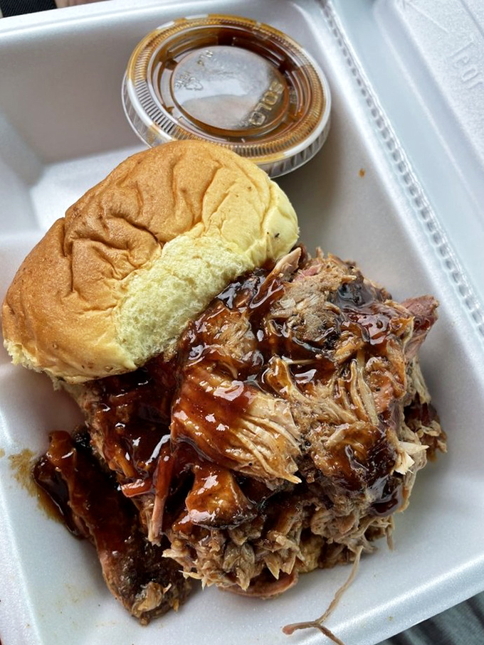 Candy yams and collard greens flanking those ribs create the holy trinity of Southern-style sides. This isn't a meal&mdash;it's a pilgrimage.