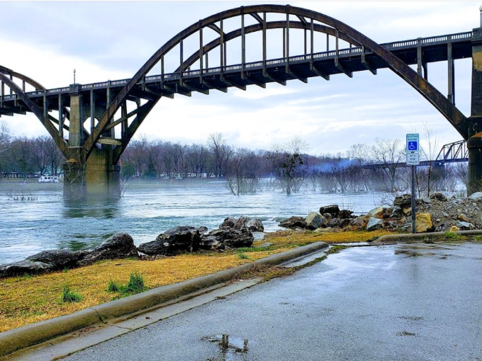 Mother Nature occasionally performs her "moody river" routine, transforming the bridge's personality from charming to contemplative as raindrops dance on water.