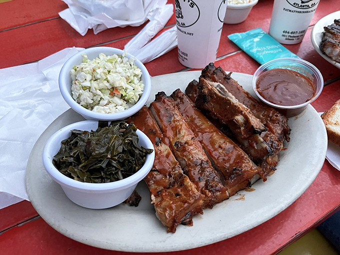 Two sides and a heavenly rack of ribs&mdash;the holy trinity of Southern comfort. Those collards aren't just a side; they're practically a religious experience.