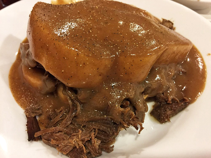 This isn't just roast beef&mdash;it's a brown gravy waterfall cascading over tender meat that surrenders to your fork without a fight. Comfort on a plate.