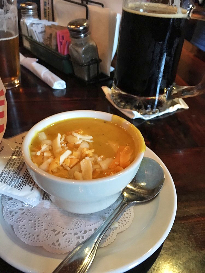 A perfect marriage: hearty cheese soup alongside that magnificent house-made root beer. Like comfort food found its soulmate in liquid form.