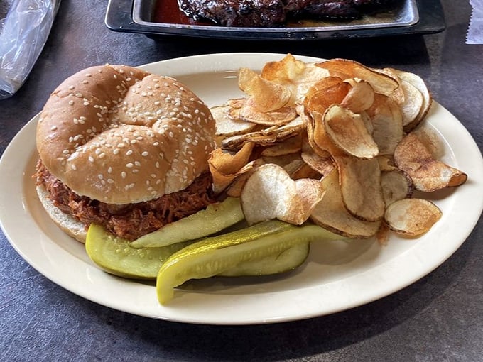 The pulled pork sandwich comes with homemade chips that crunch loud enough to announce your satisfaction to neighboring tables.
