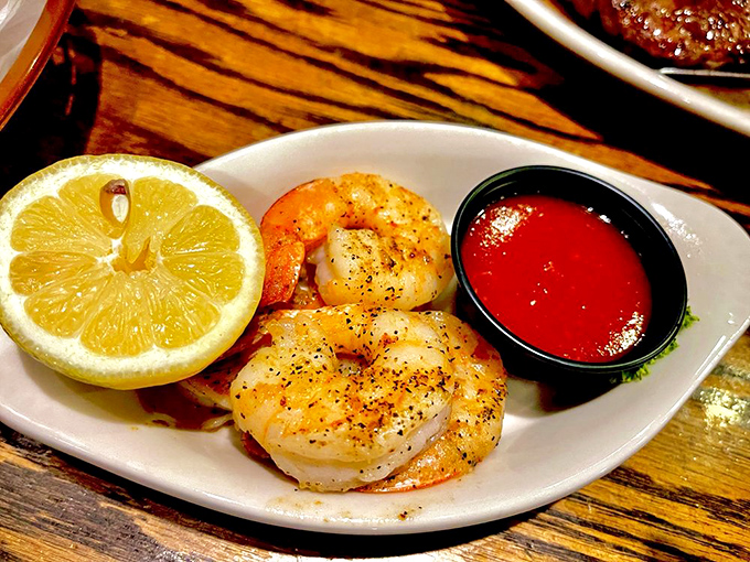 These shrimp aren't just grilled; they're transformed into oceanic ambassadors visiting beef country with diplomatic immunity from criticism.