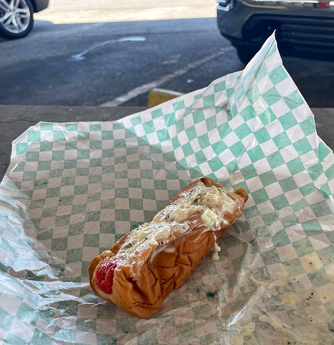 The slaw dog in its natural habitat &ndash; a thing of beauty where the cool crunch meets warm bun in perfect harmony.