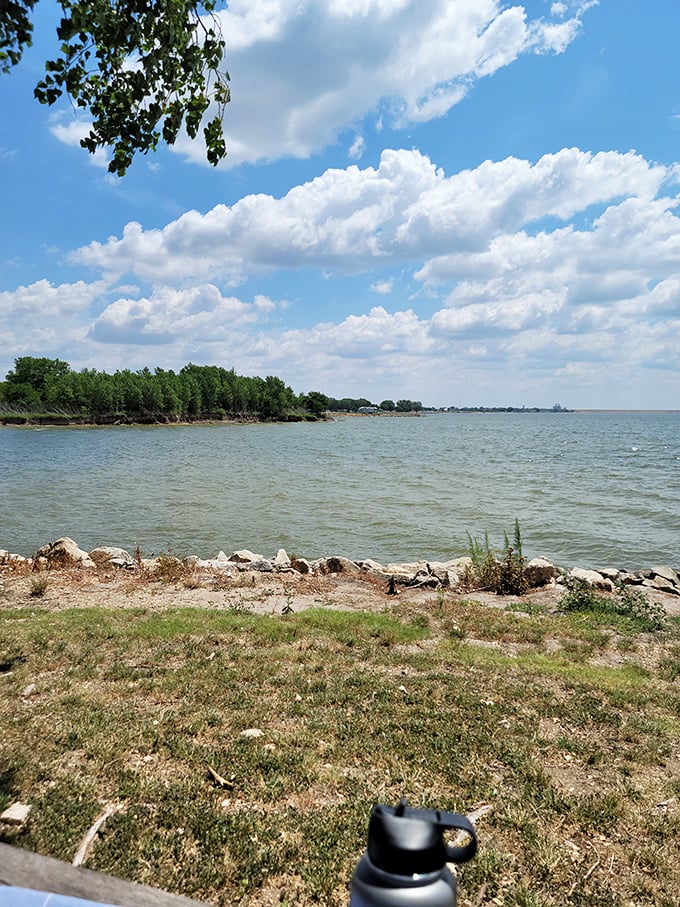 The quintessential Kansas summer view: blue water meeting bluer skies, with just enough clouds for dramatic effect.