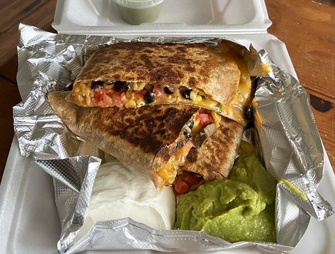 The quesadilla that launched a thousand road trips. Crispy exterior, molten interior, and sides that don't know they're supposed to be afterthoughts.