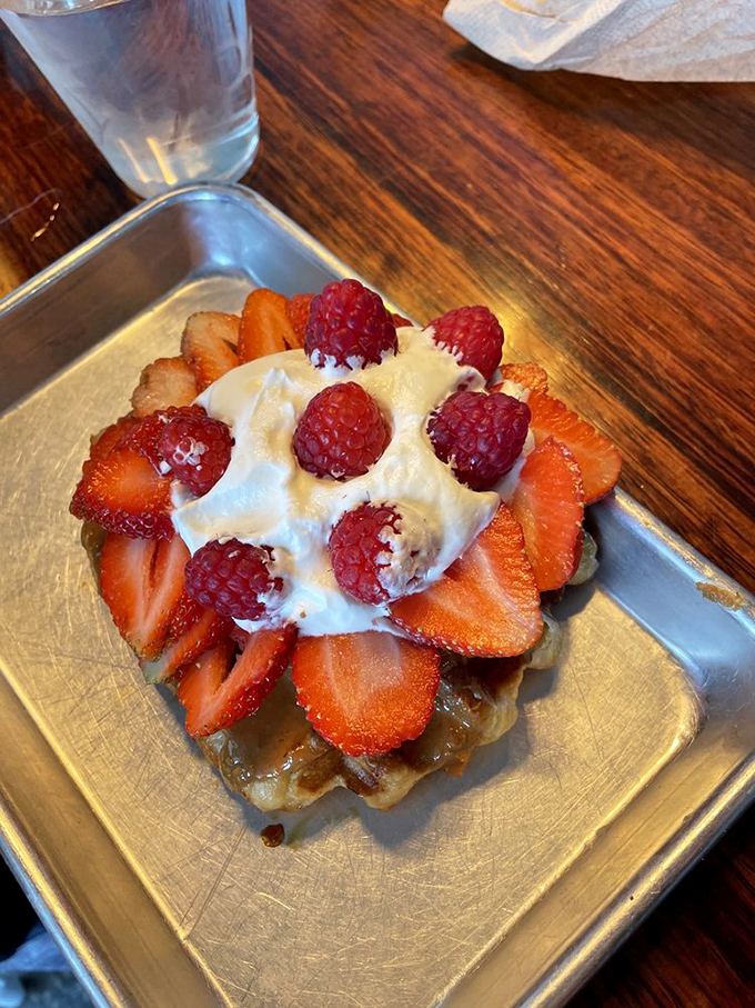 Fresh berries and cream transform this waffle into nature's candy. It's what strawberry shortcake dreams about becoming when it grows up.