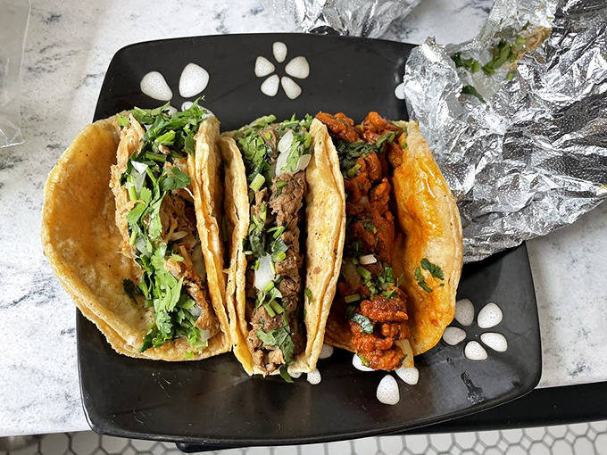 Traditional tacos that tell a story with every bite. That cilantro-onion garnish isn't just decoration&mdash;it's the exclamation point at the end of a flavor sentence.