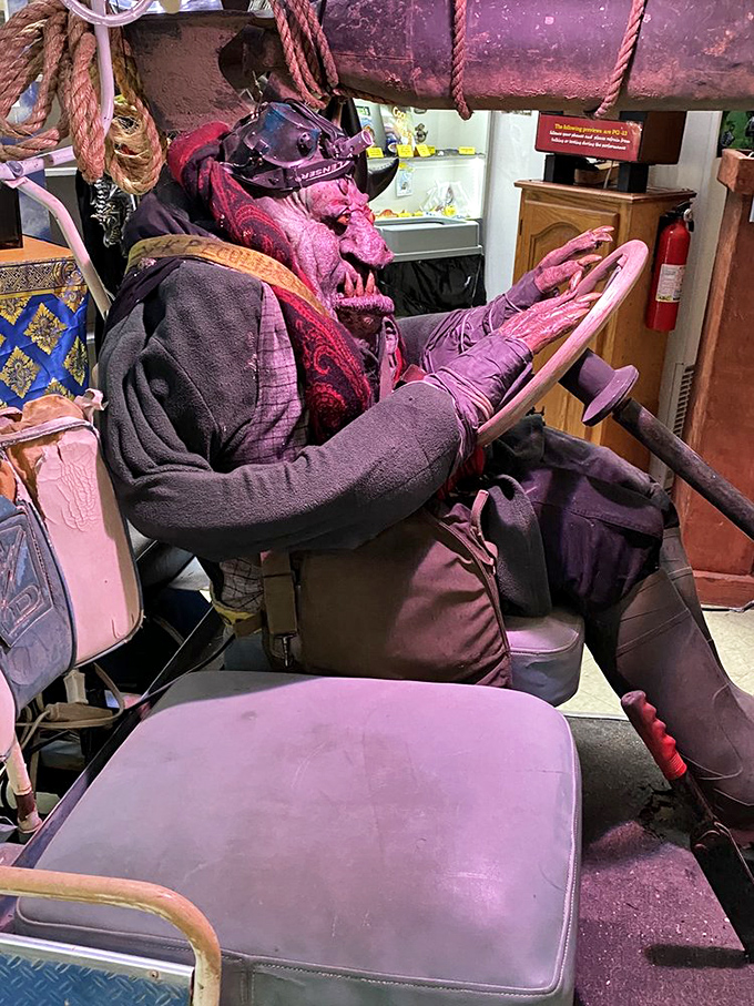 Classic movie monsters share shelf space with colorful skulls in this cabinet of curiosities – horror's greatest hits on display.