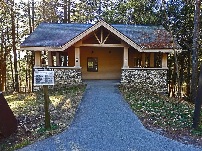 The visitor center stands as a woodland embassy between civilization and wilderness. Its craftsman-style architecture offers a moment of shelter before the main attraction. 