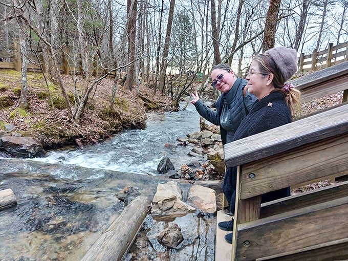 Water brings people together, even in the quieter seasons. These visitors discover that nature's simple pleasures&mdash;like a rushing creek&mdash;spark conversation better than any social media post.