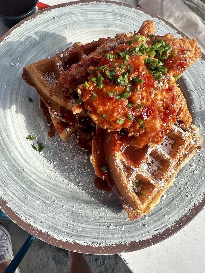 Hot sauce and maple syrup join forces atop crispy waffles and fried chicken. It's the breakfast alliance we never knew we needed but can't live without now.