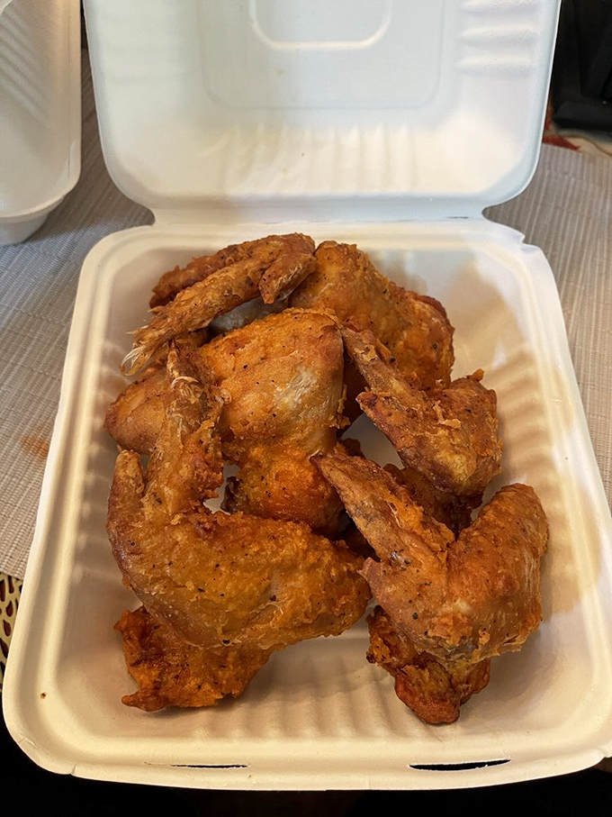 Wings that don't need a sporting event as an excuse. Golden-fried to that perfect crispiness where the first bite makes that satisfying sound that says, "You've made an excellent decision today."