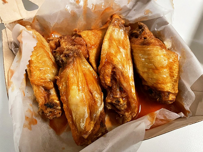 Wings so crispy and saucy, they should come with their own theme music and a standing ovation.