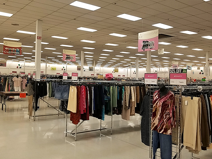The women's clothing department stretches to the horizon. Somewhere in this sea of fabric is the perfect blazer someone's been hunting for since 1997. 