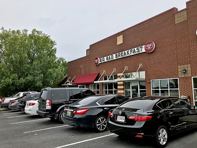 Big Bad Breakfast's brick fa&ccedil;ade and red awnings &ndash; where morning meals get the respect they deserve.