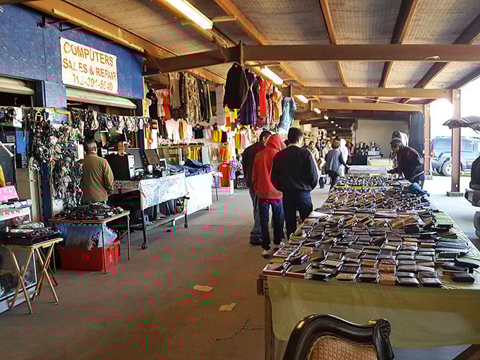 Corridors of commerce stretch into the distance! Cole's Antique Village & Flea Market's bustling lanes invite you to lose yourself in retail therapy.