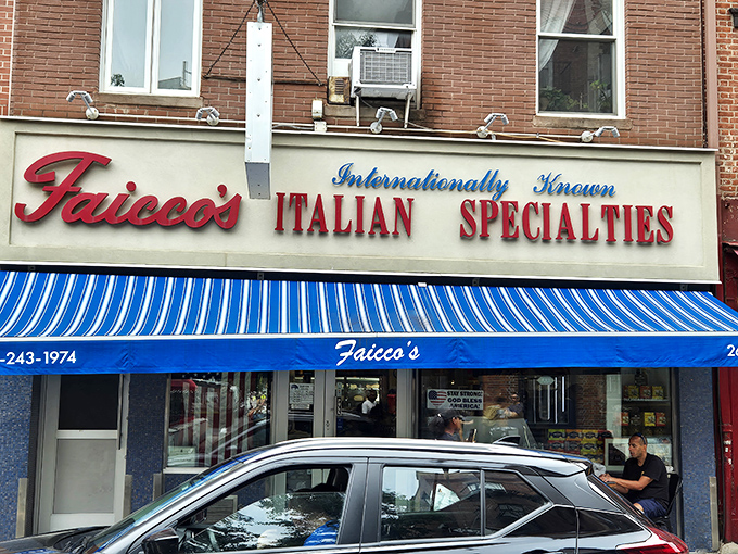 Faicco's bold red signage stands as a defiant reminder that Italian delis still rule New York's sandwich scene.