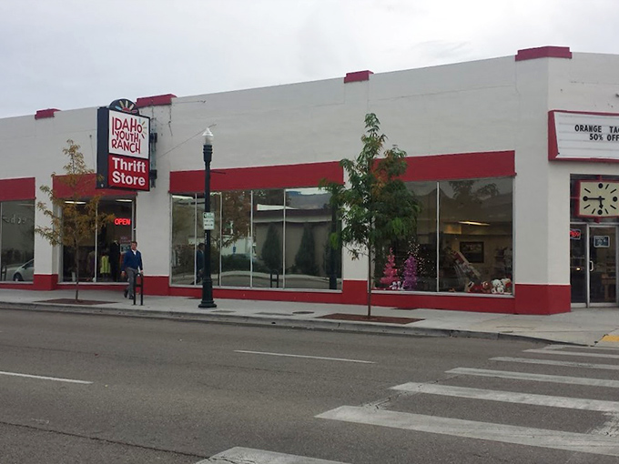 Classic red trim frames this downtown gem where vintage treasures wait like old friends at a reunion.