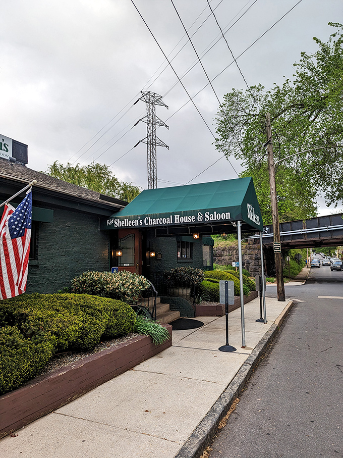Nestled under power lines with an American flag proudly displayed – this neighborhood haunt screams "local treasure" before you even taste a bite.
