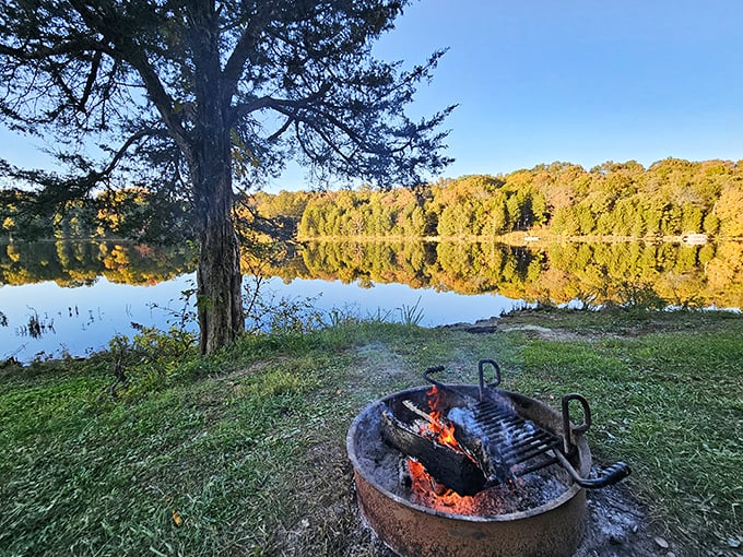 Kincaid Lake's glassy waters reflect Kentucky's endless sky – a mirror to nature's perfect symmetry.