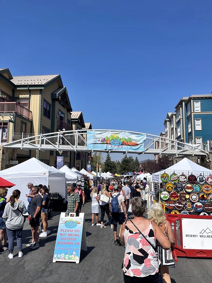 Main Street transforms into a pedestrian paradise where mountain air mingles with the scent of fresh crepes and creativity.