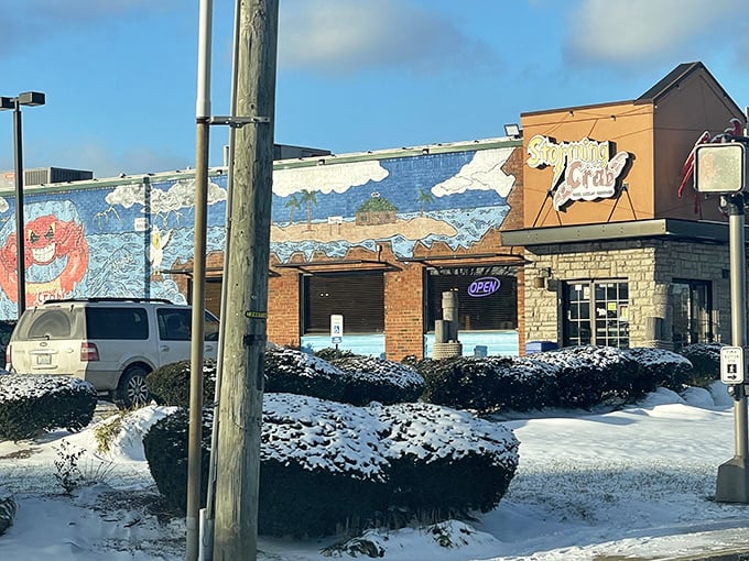 Storming Crab makes a bold statement with its vibrant mural and signage - a colorful invitation to get deliciously messy!