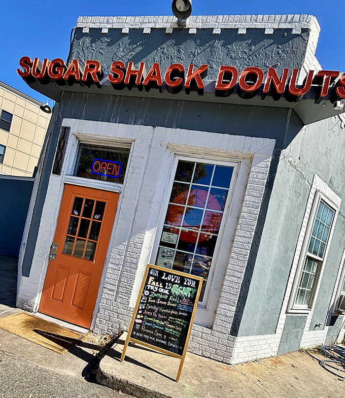 Sugar Shack's blue building with that bright orange door is like a portal to a more delicious dimension.